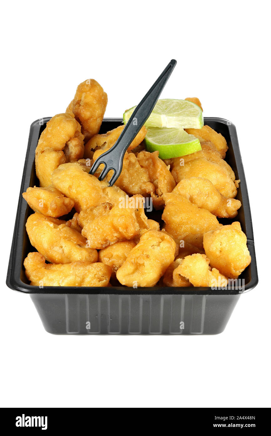 Kibbeling in a plastic tray isolated on white background. Kibbeling is ...