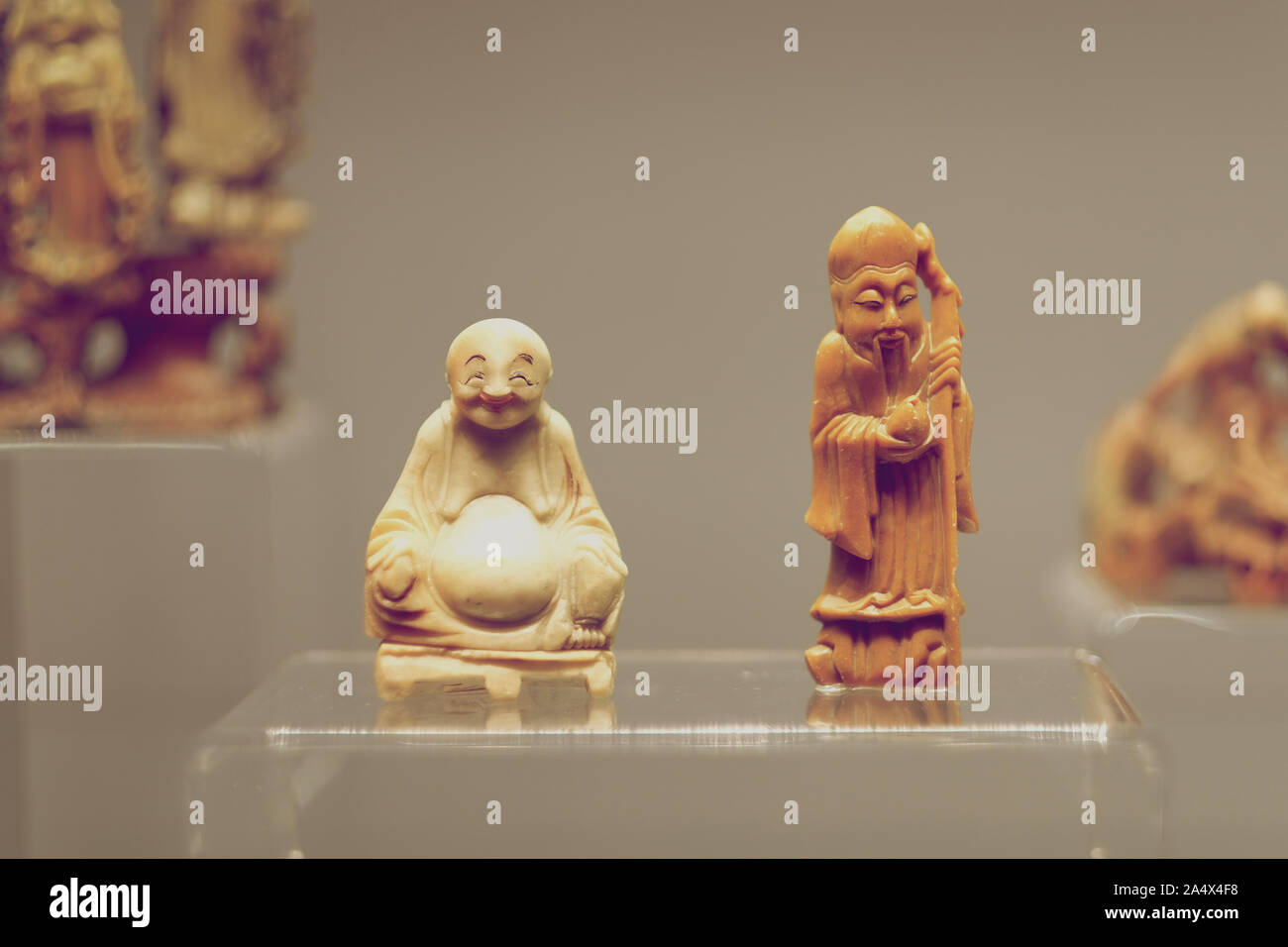 Figures of miniature sculpture made of bone in the technique of carving ...