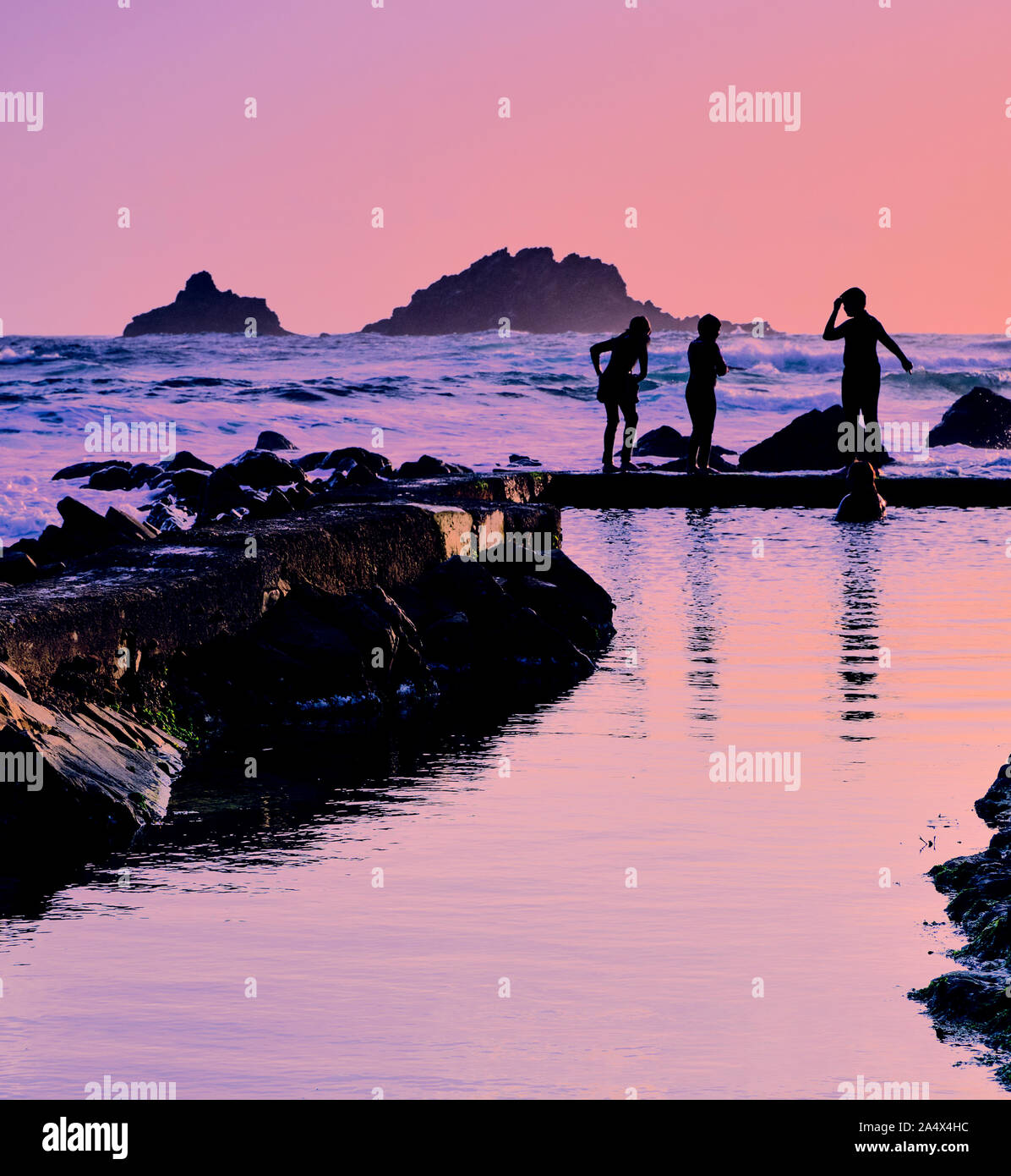 Swimmers in ocean pool Stock Photo - Alamy