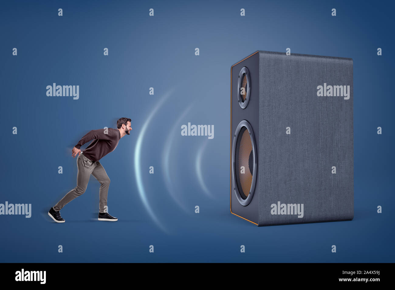 A large vintage speaker emits strong sound-waves and almost sweeps a ...