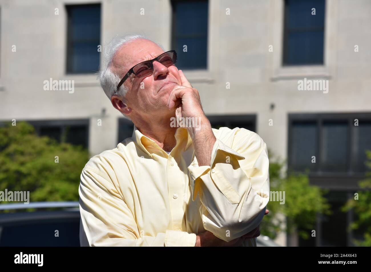 An Old Senior Man Decision Making Stock Photo - Alamy