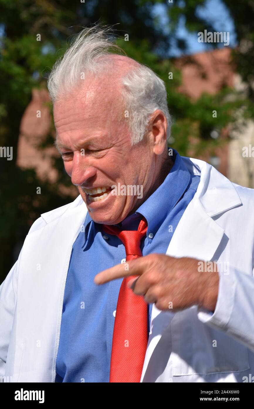 Crazy Science Professor Pointing Stock Photo - Alamy