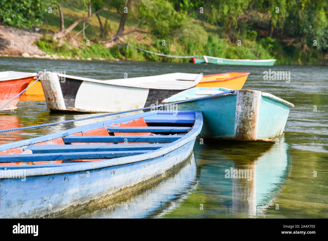 Colorful canoes in Tamul river at Huasteca Potosina Stock Photo - Alamy