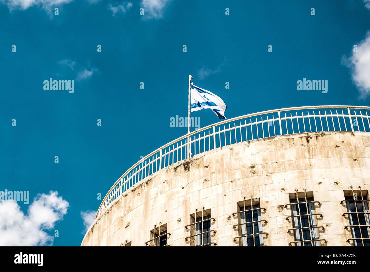 Jerusalem Historical City Hall Building, flag of Israel and blue sky ...
