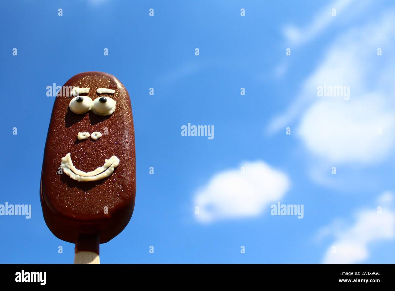 The picture shows a funny ice cream with a face Stock Photo - Alamy