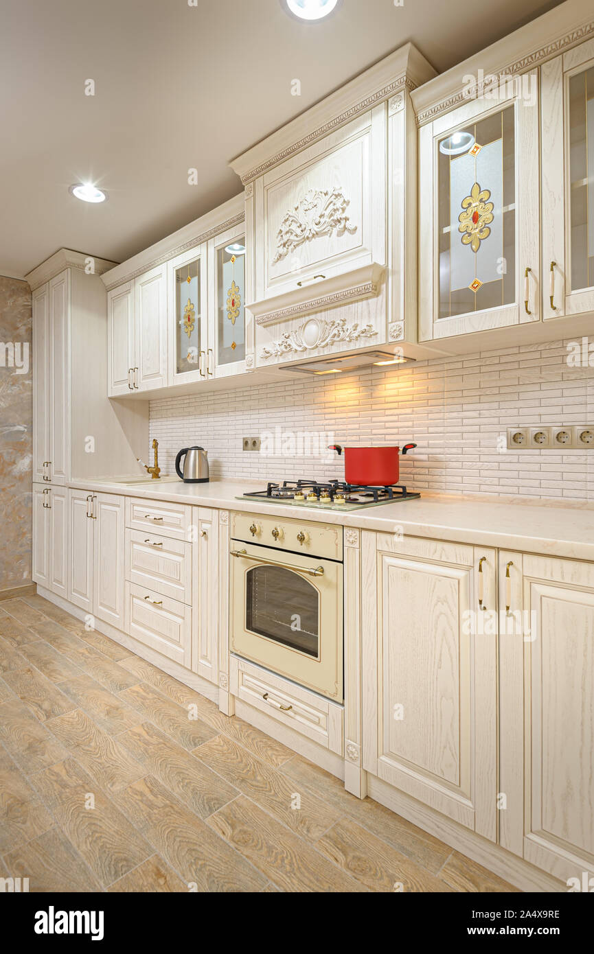 Luxury modern white and beige kitchen interior Stock Photo - Alamy