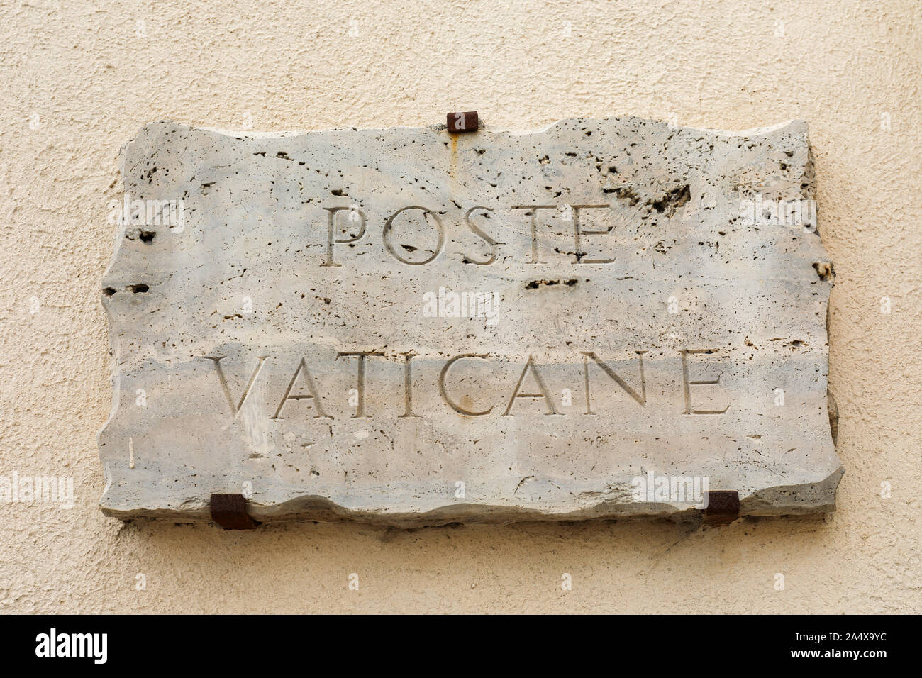 Poste Vaticane carved stone sign on the outer wall of Vatican post ...