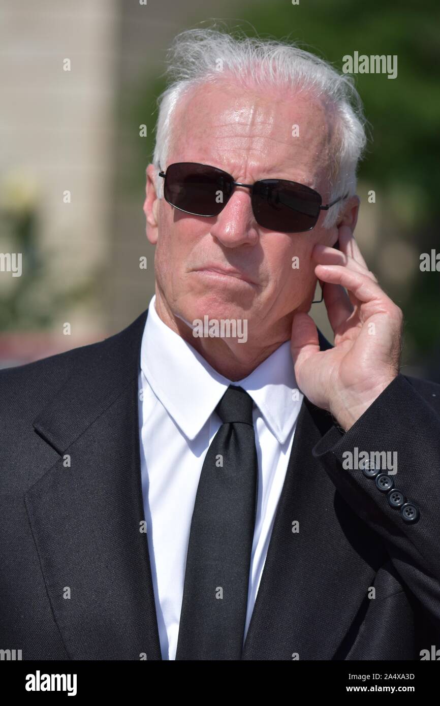 Handsome bodyguard hi-res stock photography and images - Alamy