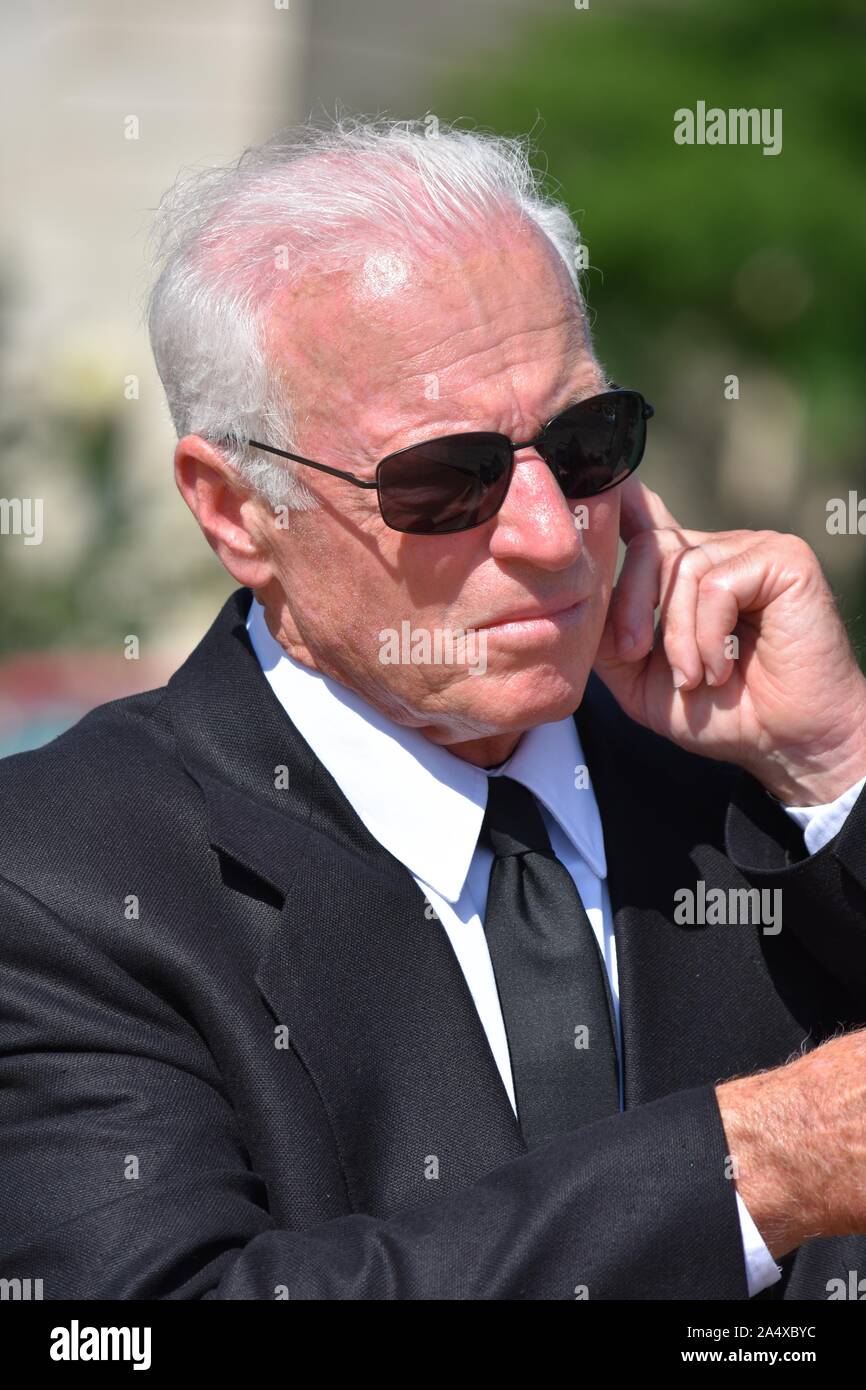 Serious Security Guard Wearing Sunglasses Stock Photo - Alamy
