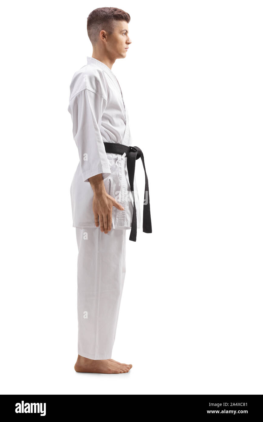 Full length profile shot of a young boy in karate kimono isolated on ...
