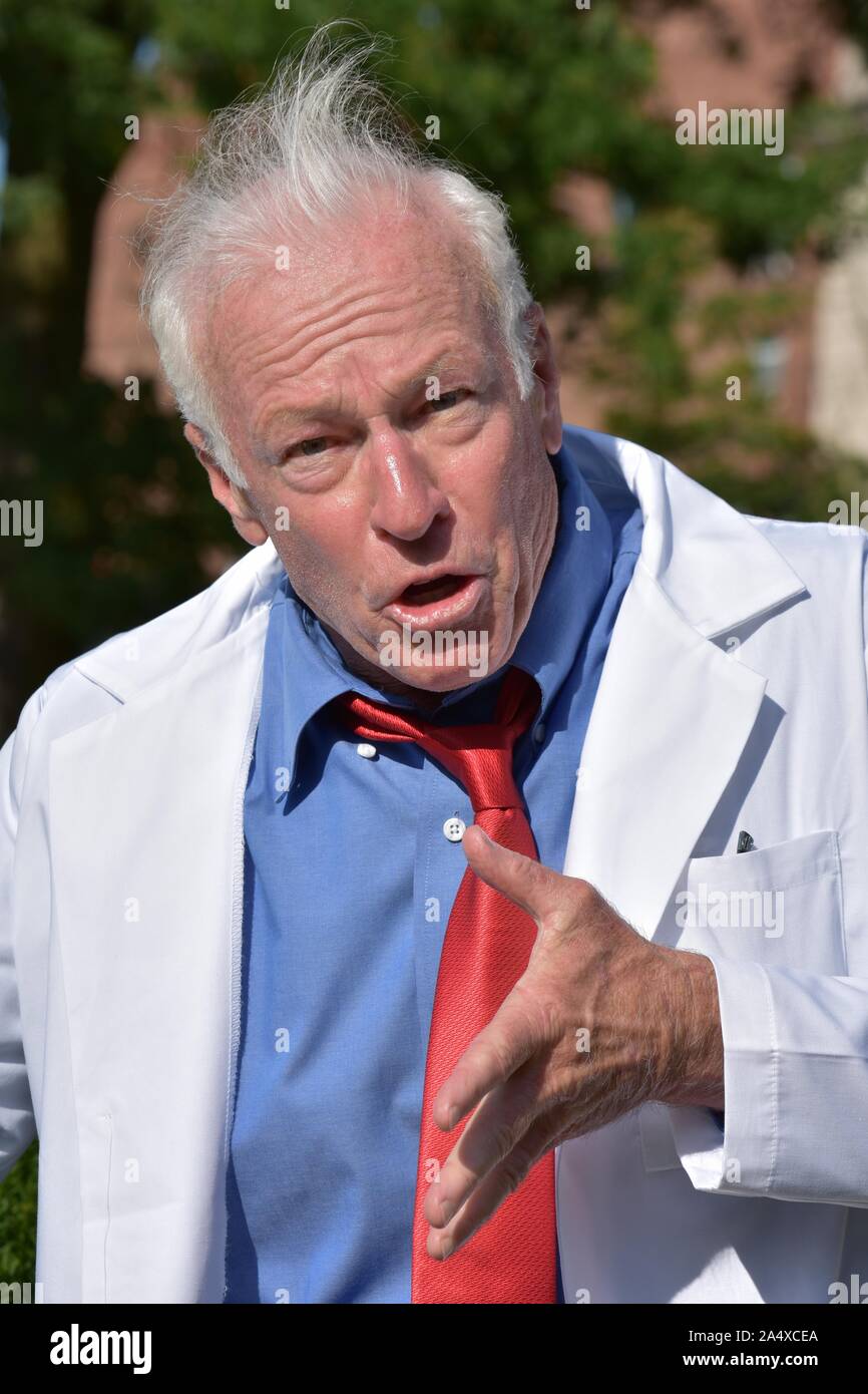 Crazy Male Science Professor Talking Stock Photo - Alamy