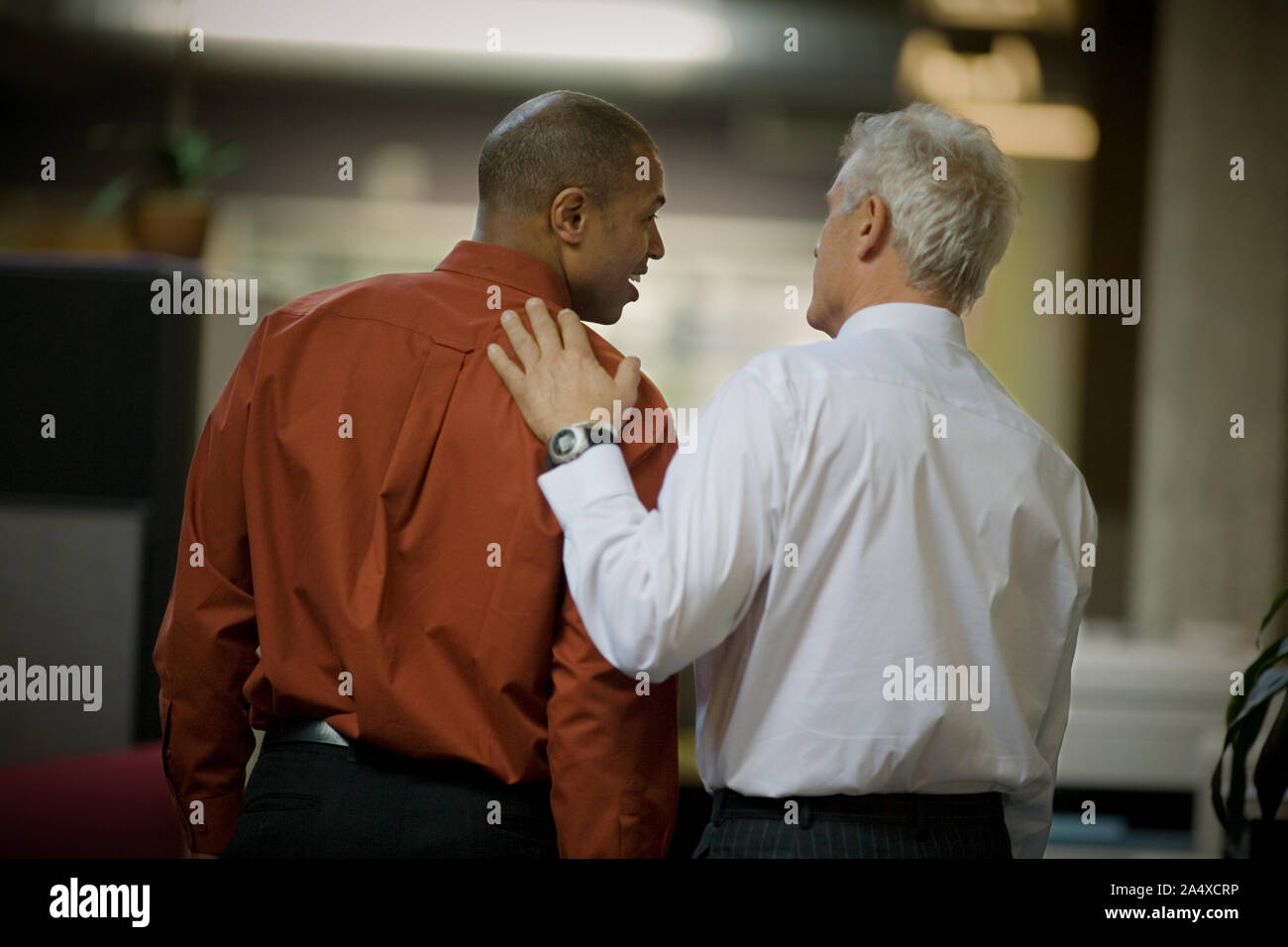 Patting On Back High Resolution Stock Photography and Images - Alamy