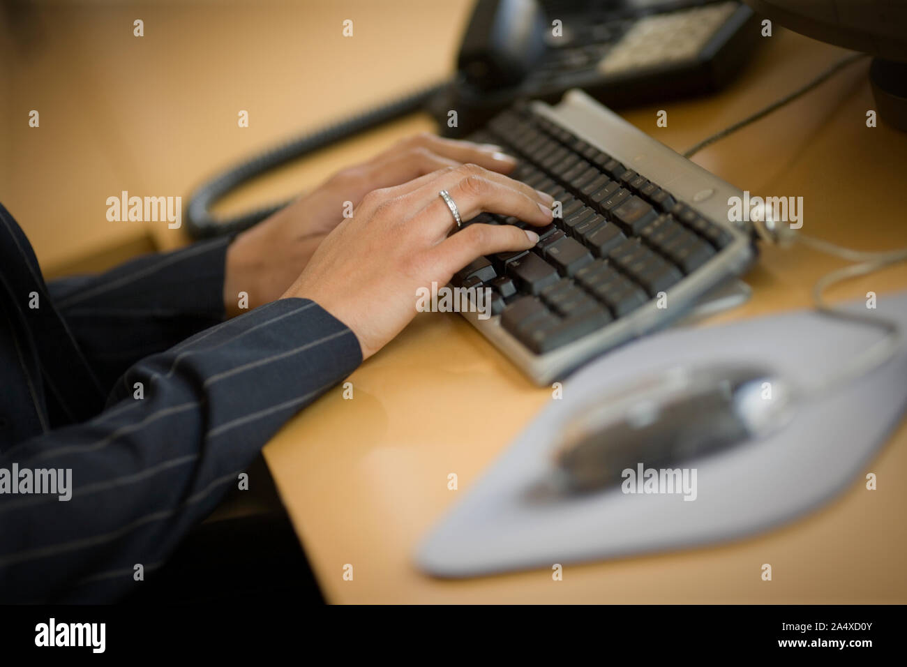 Computer keyboard being used by a business woman in an office Stock ...