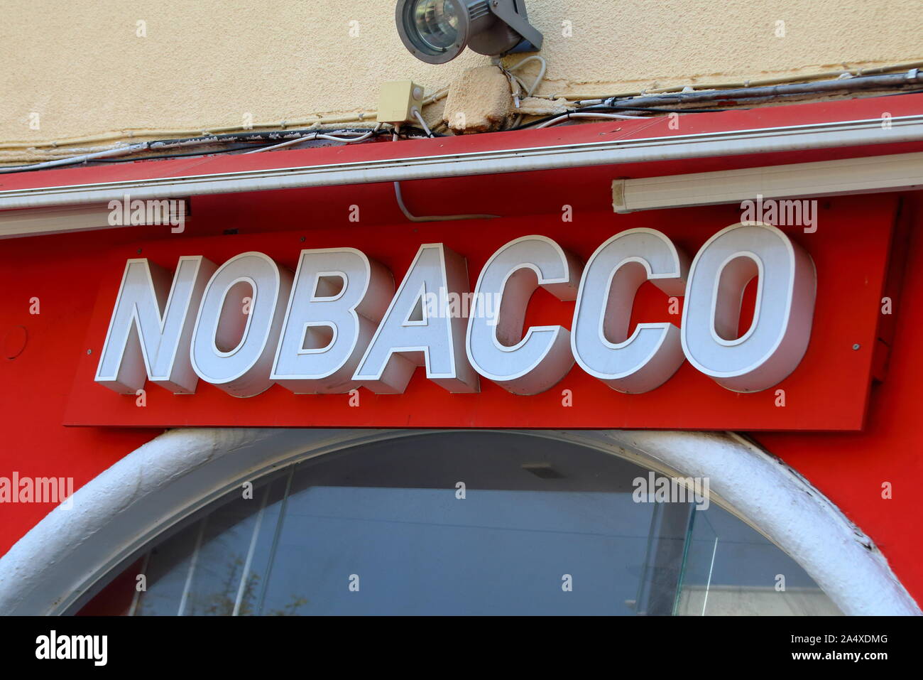 Red sign and white lettering hi-res stock photography and images - Alamy