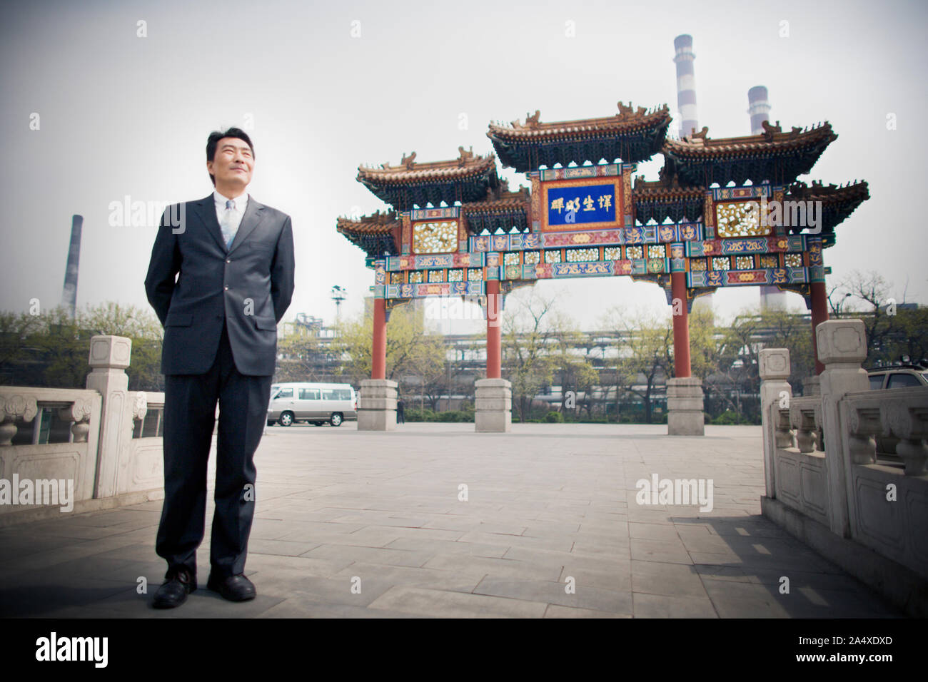 Chinese men posing in front hi-res stock photography and images - Alamy