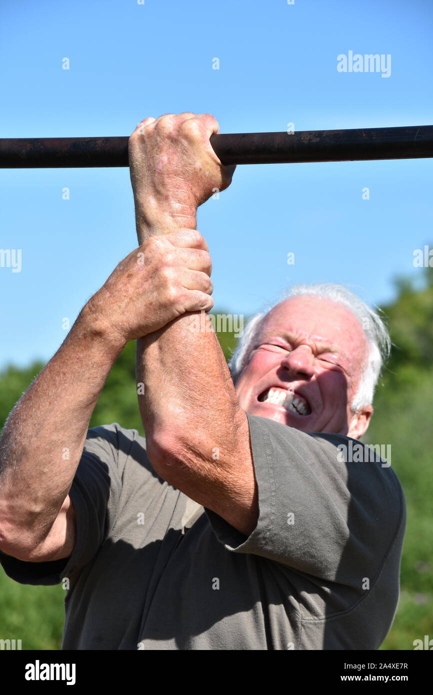Strong Male Veteran Exercising Stock Photo - Alamy