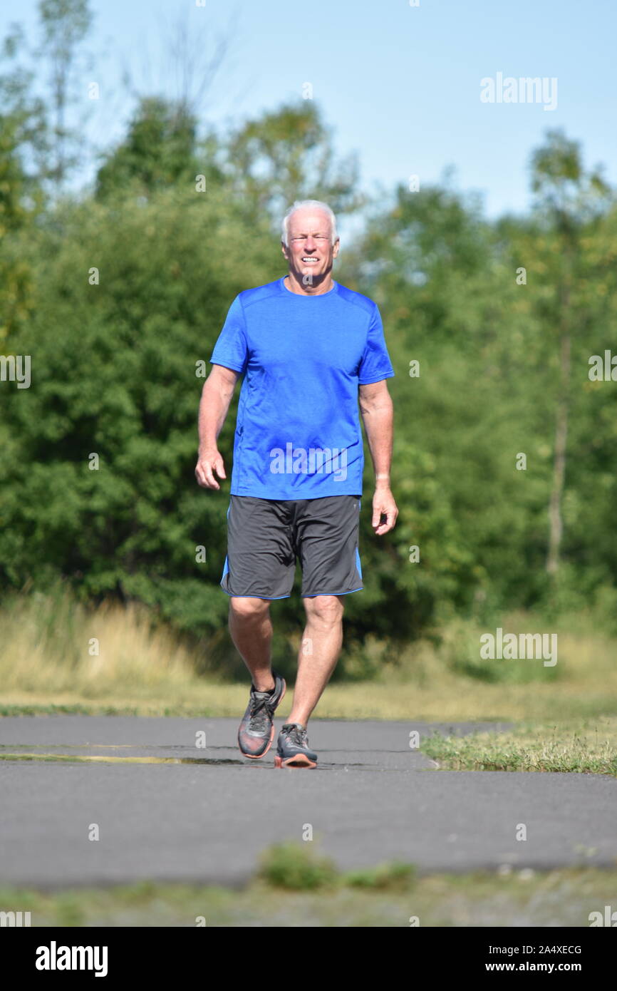 Male Senior And Happiness Walking Stock Photo - Alamy