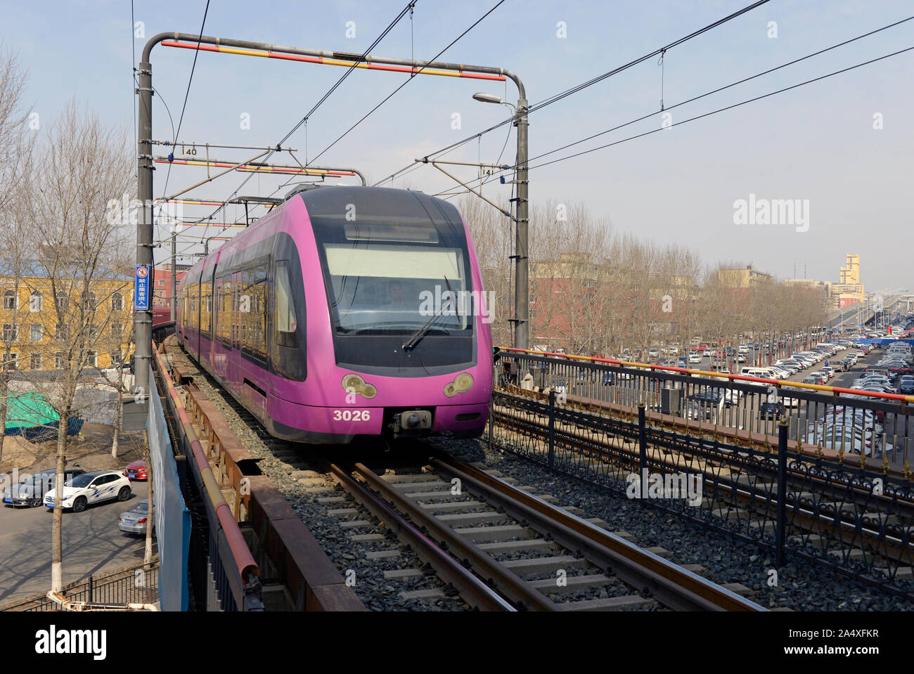 Light rail train approaches a station on Changchun subway line 3 ...