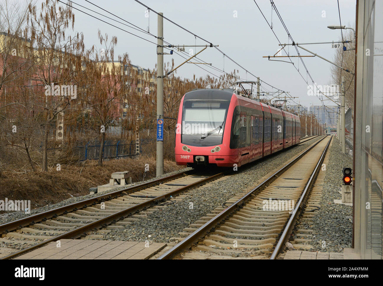 Light rail train on Changchun subway line 3 near Nanchang Road station ...