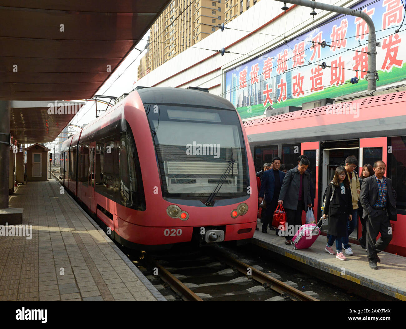 Passengers alight at Changchun subway light rail line 3's Changchun ...