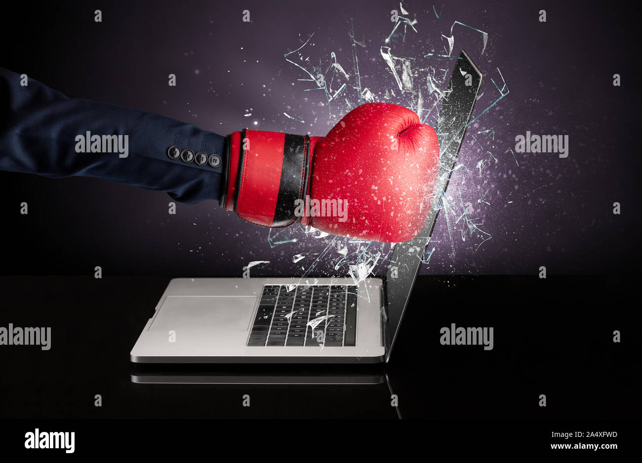 Hand hitting strongly laptop screen glass Stock Photo - Alamy