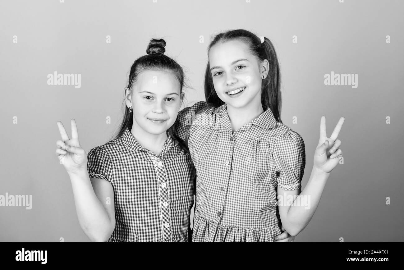 Peace begins with you. Cute small children gesturing V signs for peace ...