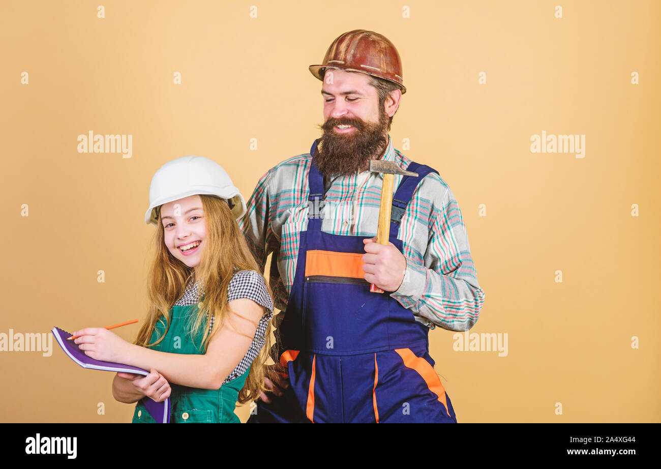 Kid girl planning renovation. Child renovation room. Family remodeling ...