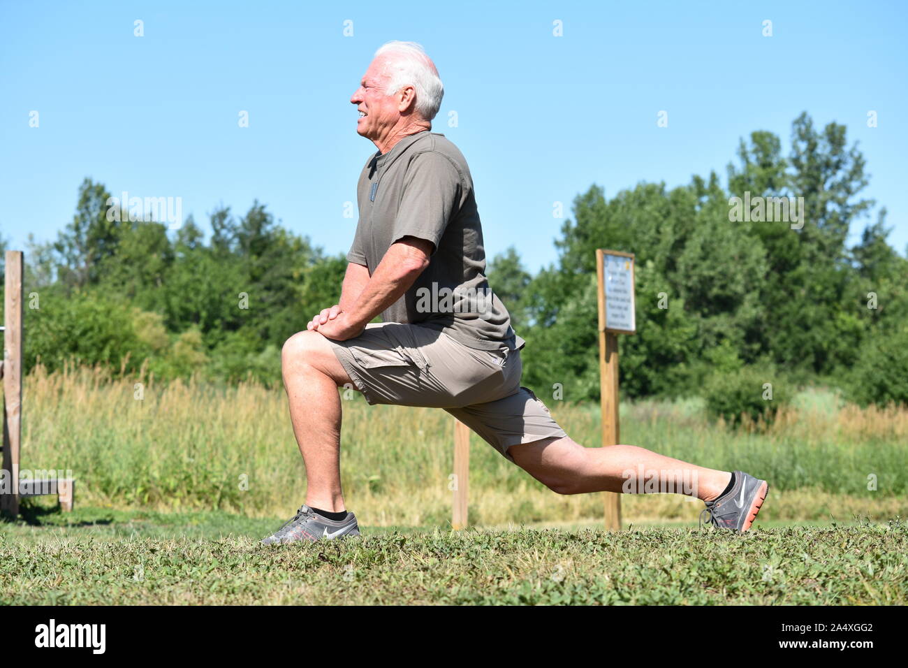 An Army Senior Male Veteran Stretching Stock Photo - Alamy