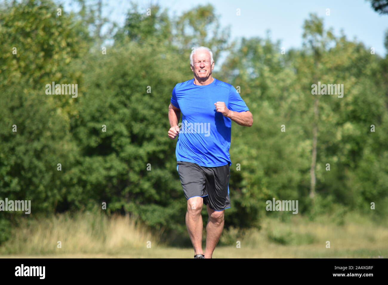 Elderly men jogging hi-res stock photography and images - Alamy