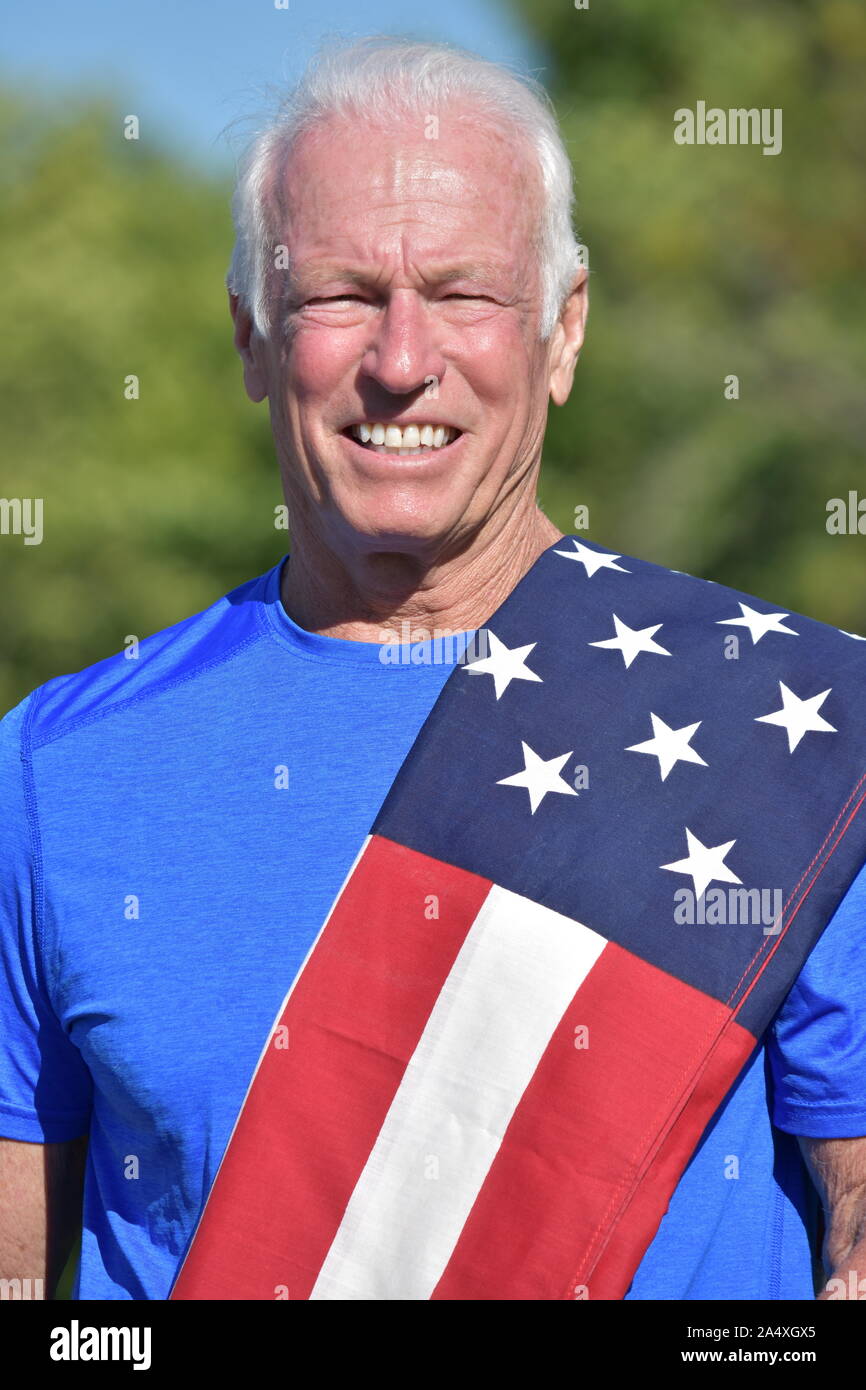 Patriotic Senior Male With American Flag Stock Photo - Alamy