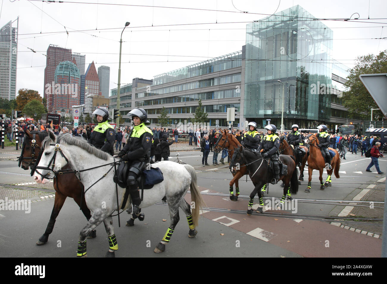 Dutch mounted police patrol on the roads next the Parliament during ...