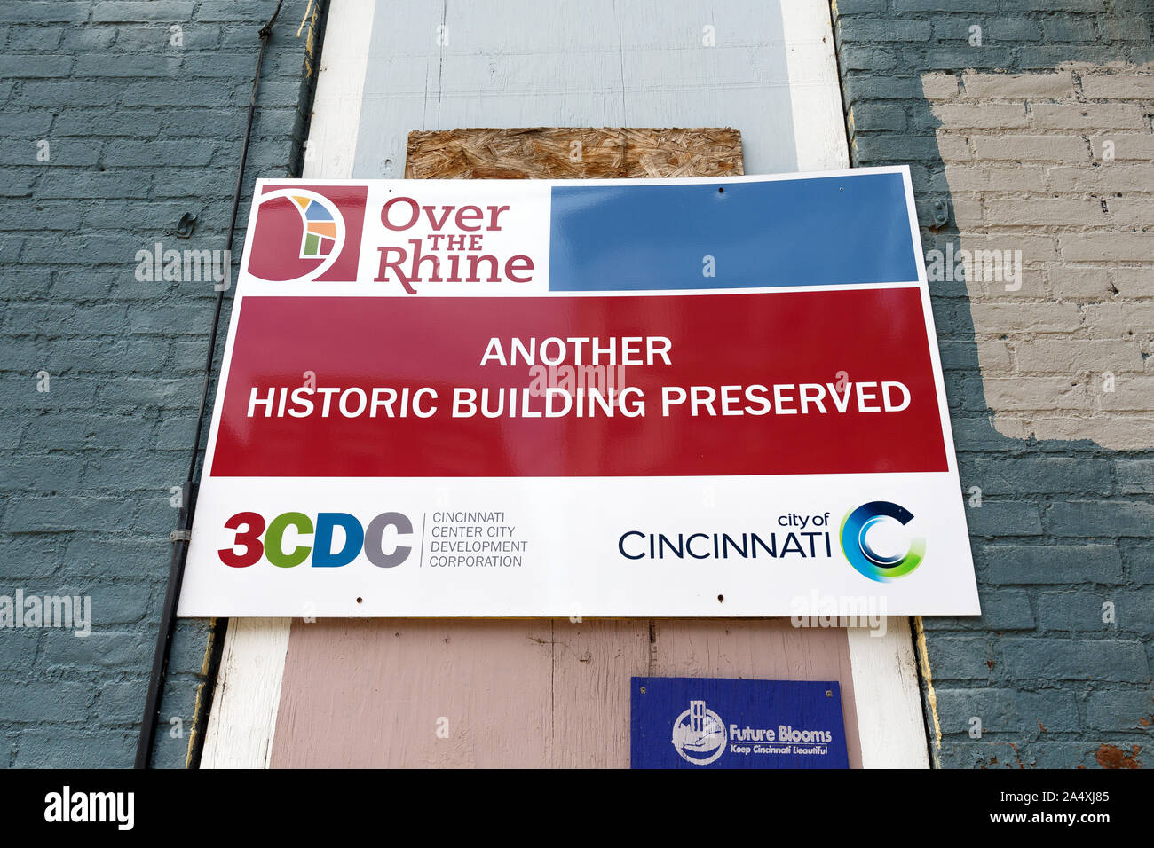 Cincinnati, OH – Circa JULY 2013 – A sign on a building in the rapidly ...