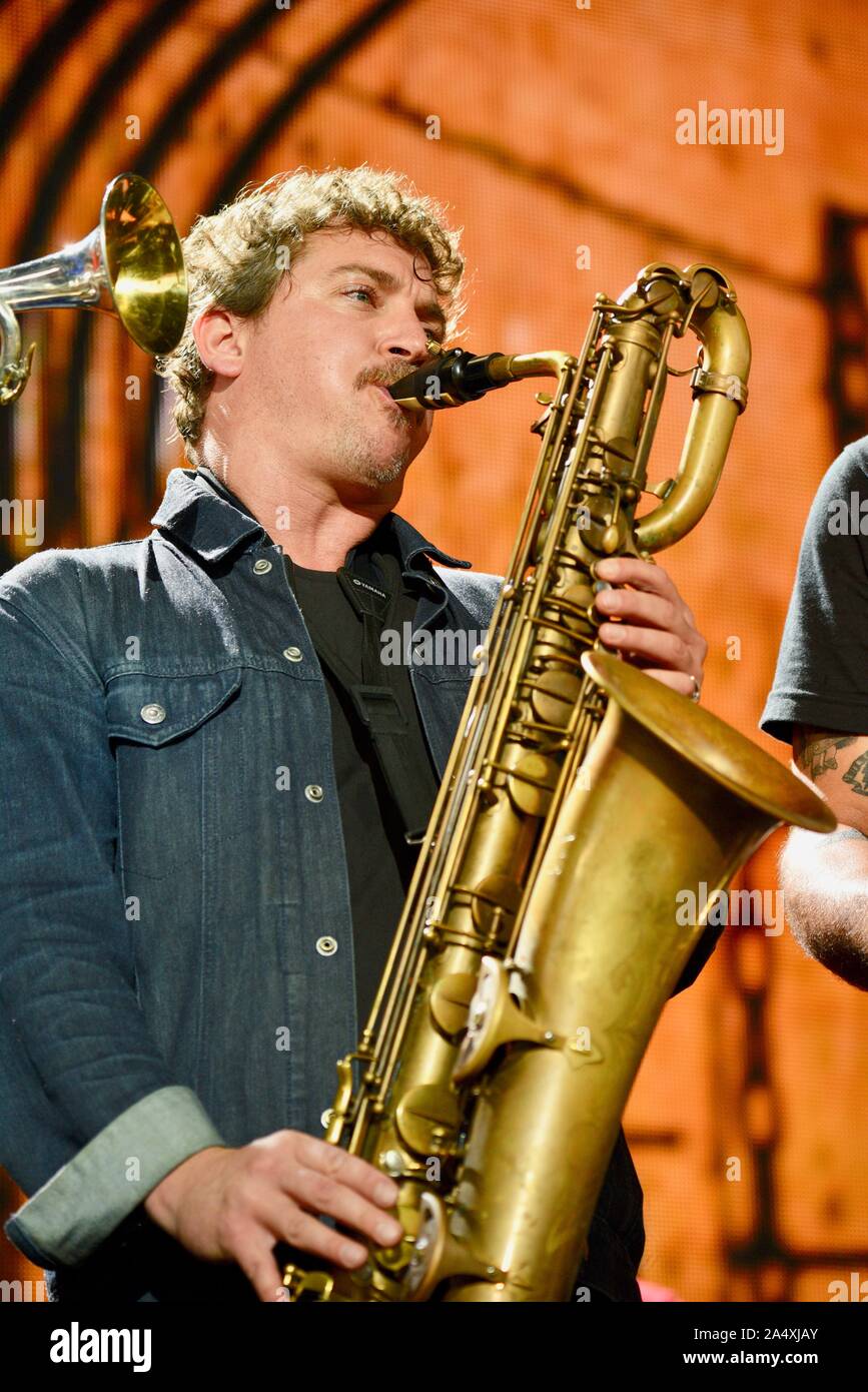 Man playing baritone saxophone hi-res stock photography and images - Alamy