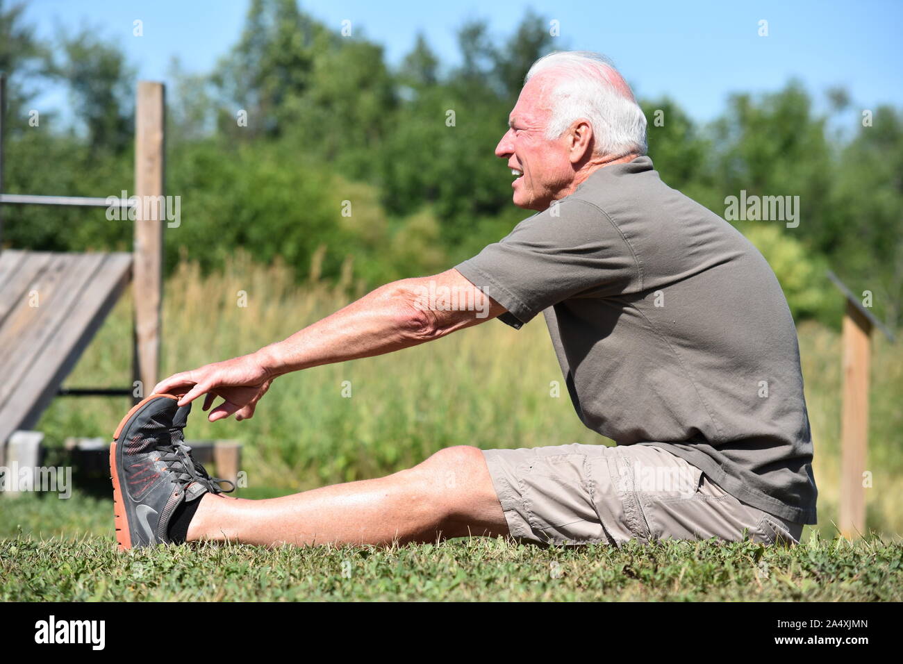 Stretching Army Senior Male Veteran Stock Photo - Alamy
