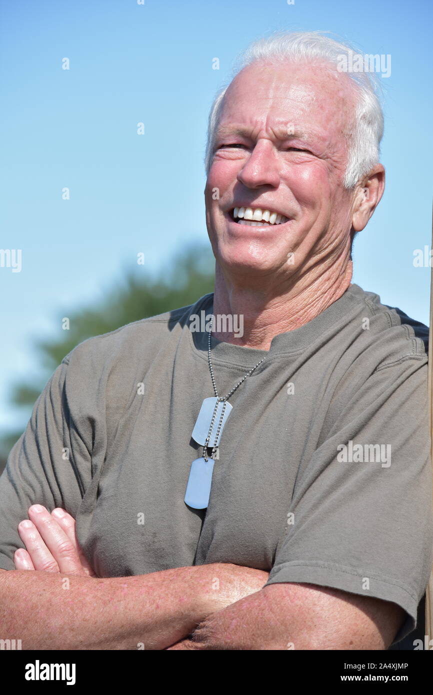 Smiling Army Senior Male Veteran Stock Photo - Alamy