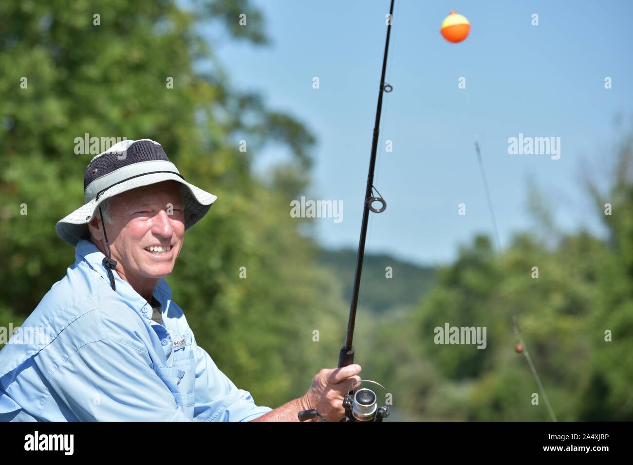 Person with rod hi-res stock photography and images - Alamy