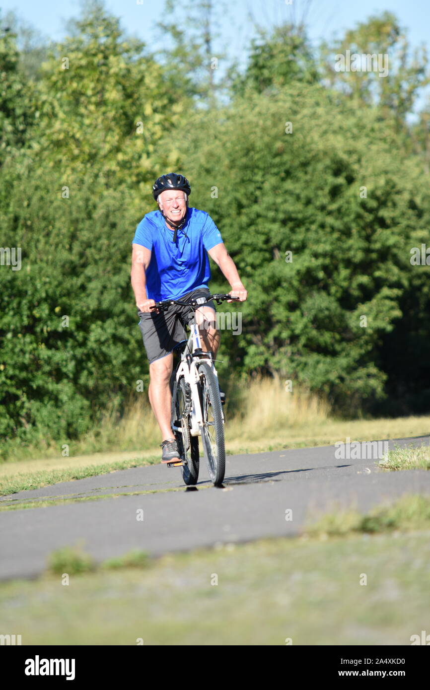 Male cyclist with bike hi-res stock photography and images - Alamy