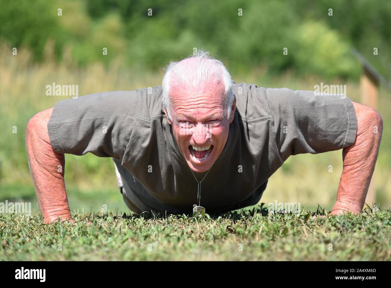 Brave Older Senior Male Veteran Exercising Stock Photo - Alamy