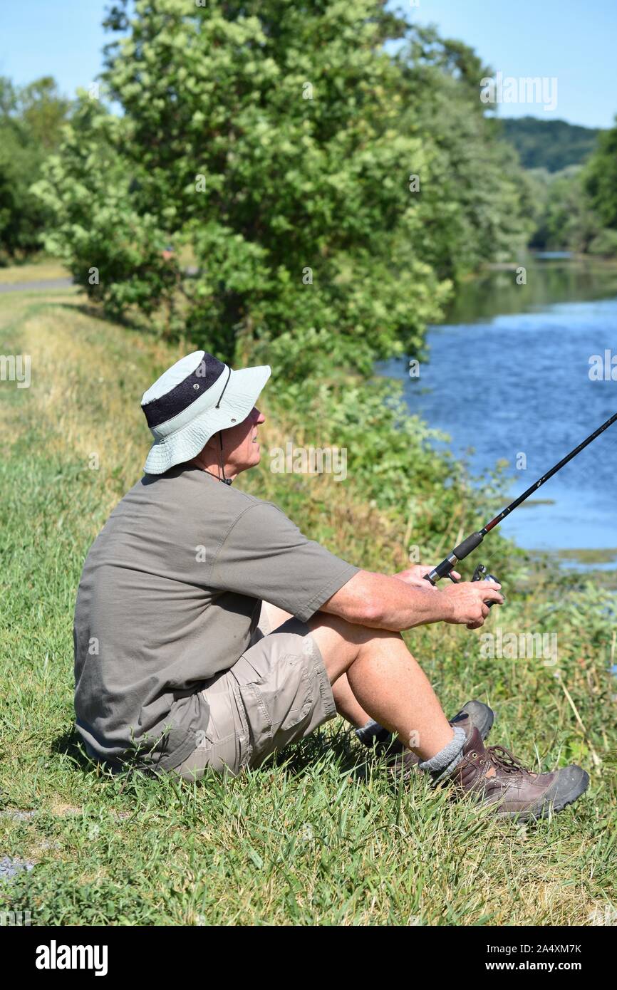 Man with rod hi-res stock photography and images - Alamy