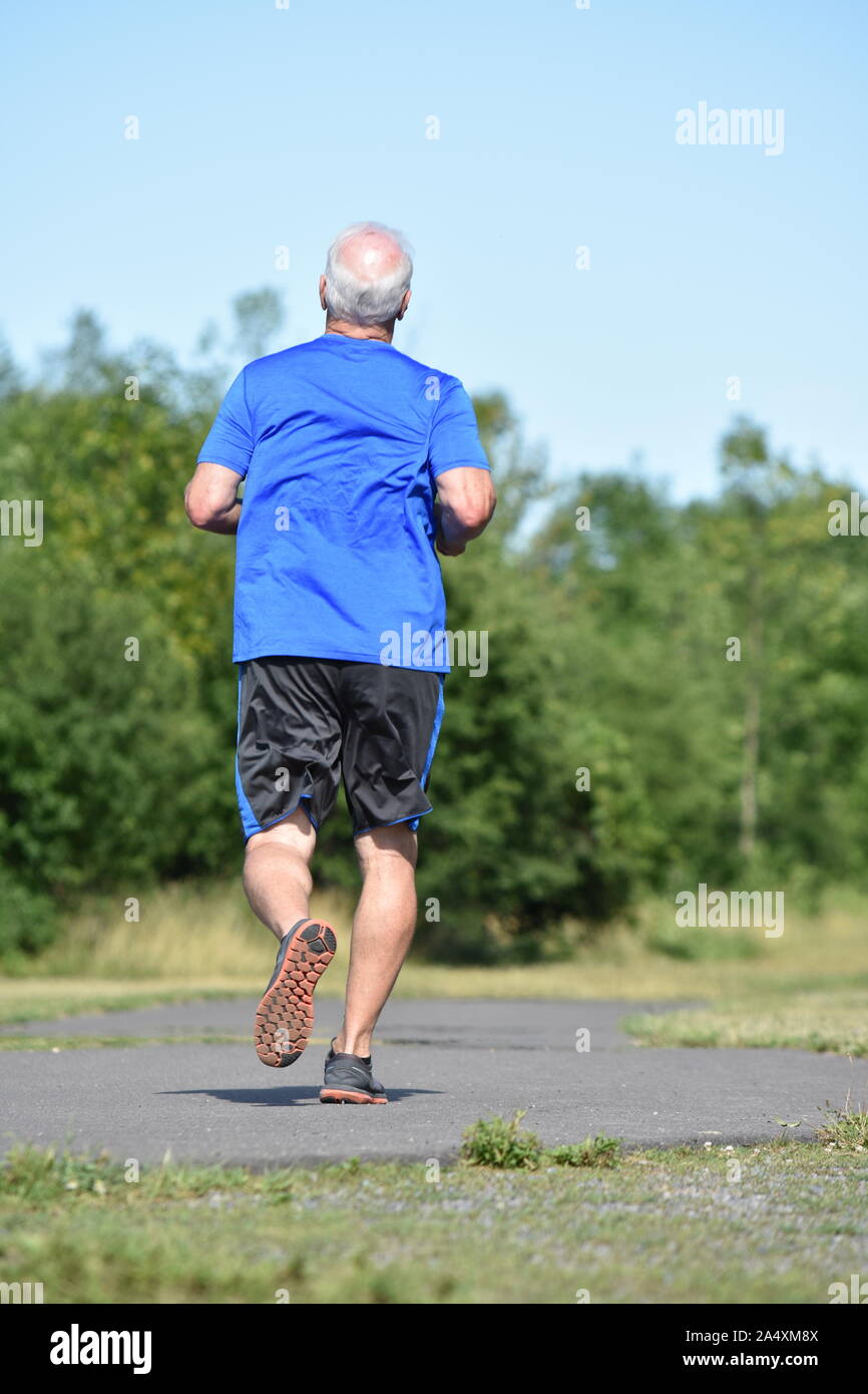 Bald Man Jogging Outdoors Stock Photo - Alamy