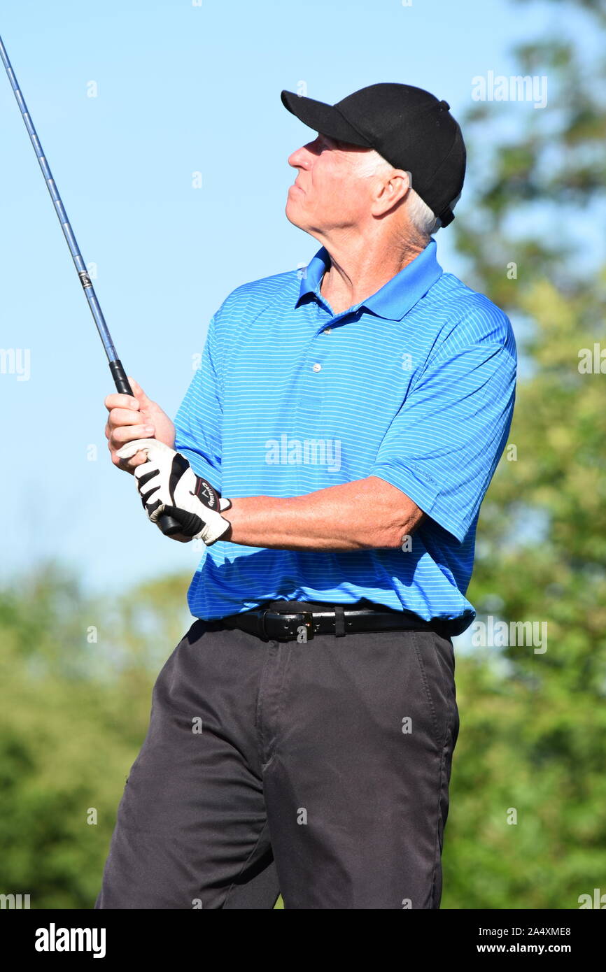 Serious Athletic Senior Male Golfer With Golf Club Stock Photo - Alamy