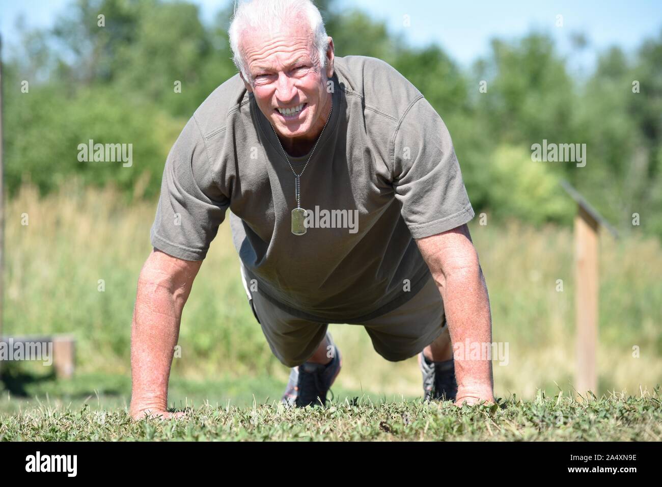 Toned Veteran Soldier Exercising Stock Photo - Alamy
