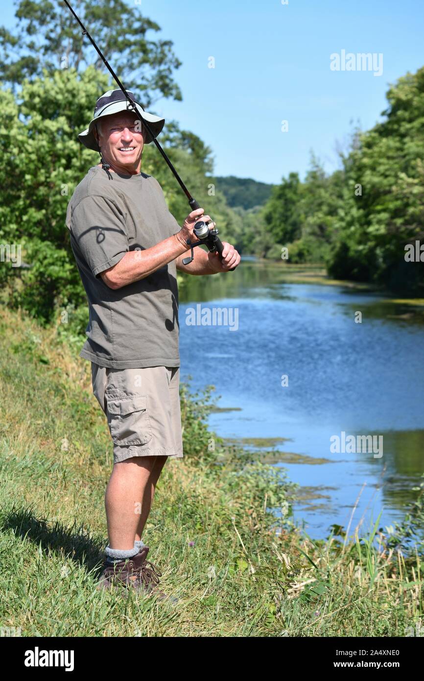 Happy angler hi-res stock photography and images - Alamy