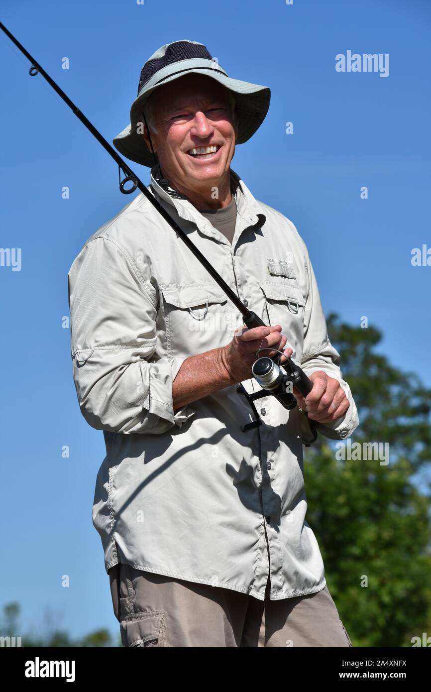 Smiling angler hi-res stock photography and images - Alamy
