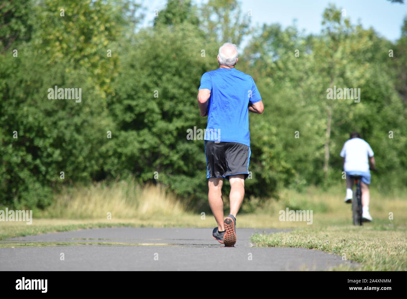 People Outdoors Exercising Stock Photo - Alamy