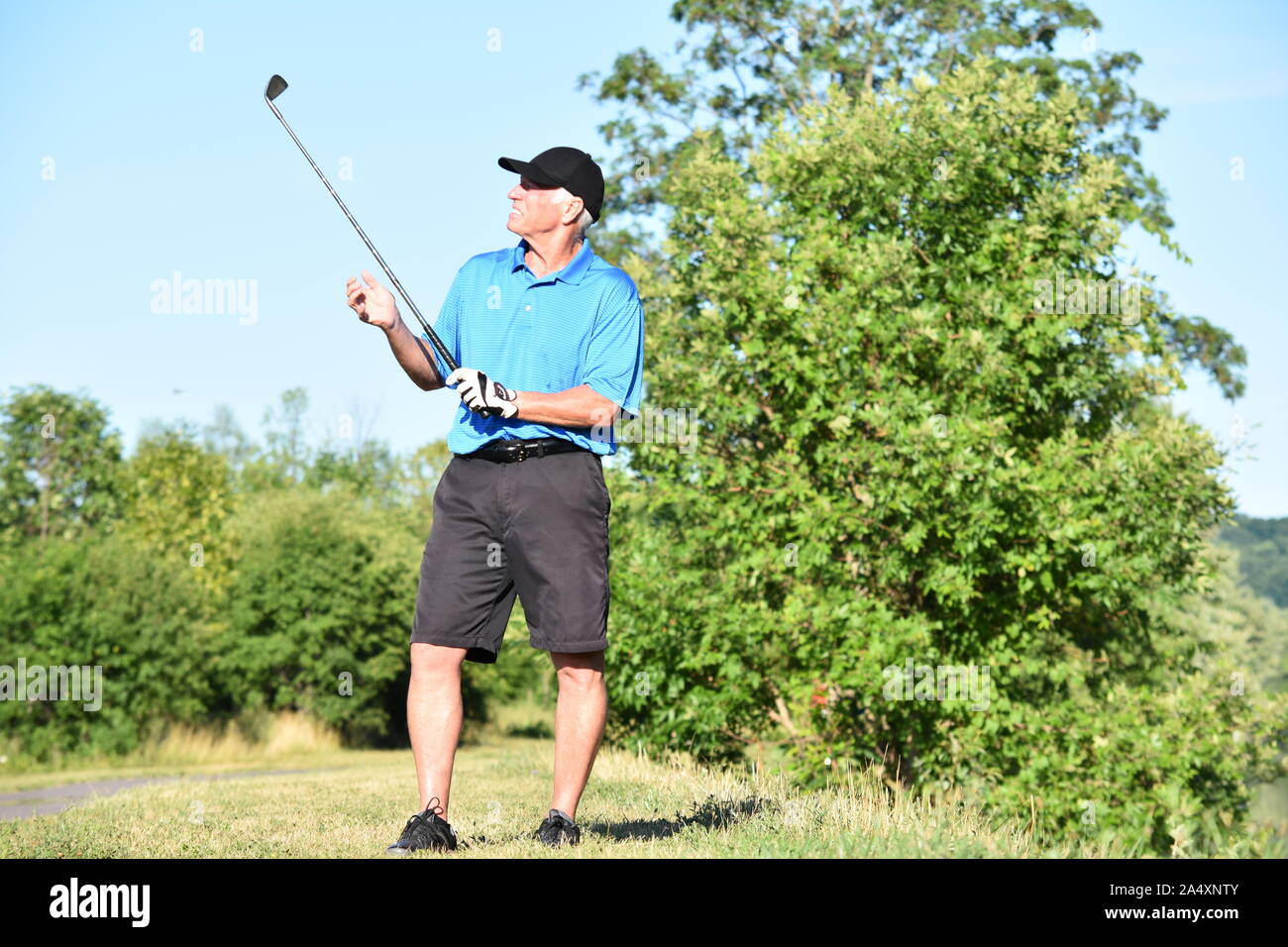 Older Senior Male Golfer Outdoors With Golf Club Stock Photo - Alamy