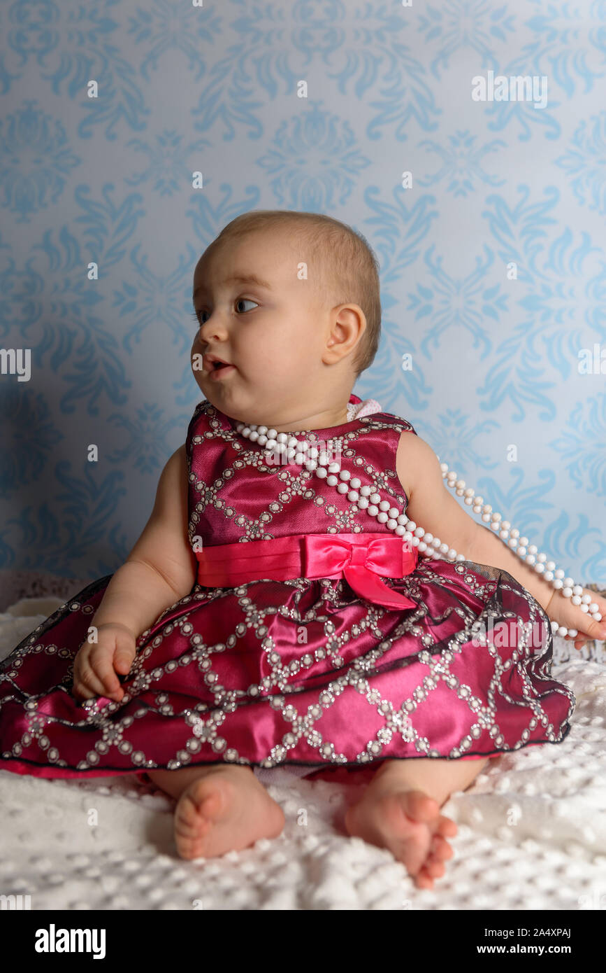 Portrait of adorable baby girl. Childhood. Authentic image Stock Photo ...