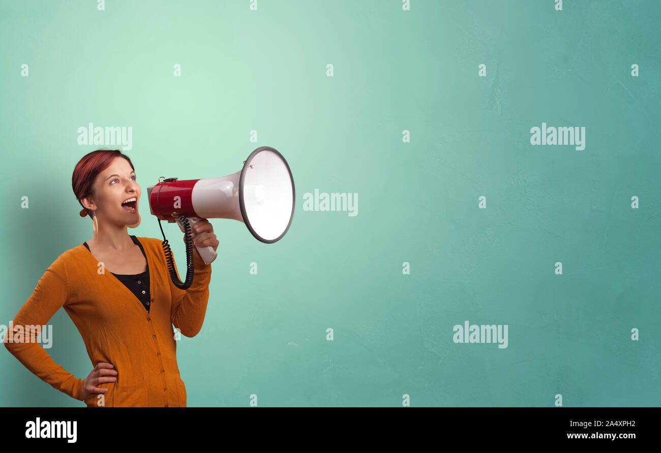 Person speaking in loudspeaker concept Stock Photo - Alamy