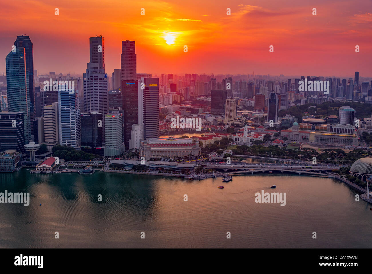 Downtown Singapore at sunset. Viewed from the top of the Marina Bay ...
