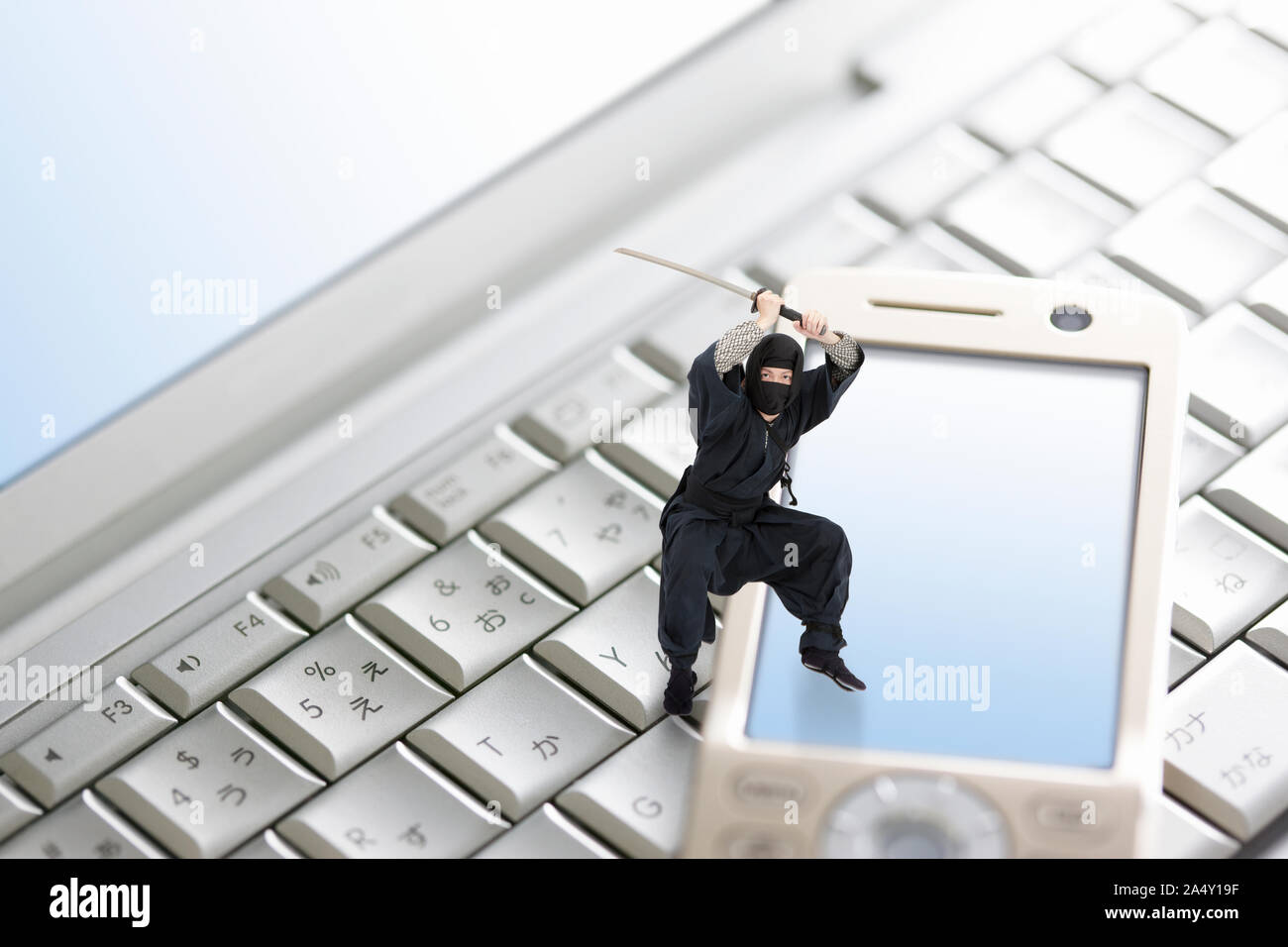 Ninja and mobile phone screen and PC Stock Photo - Alamy